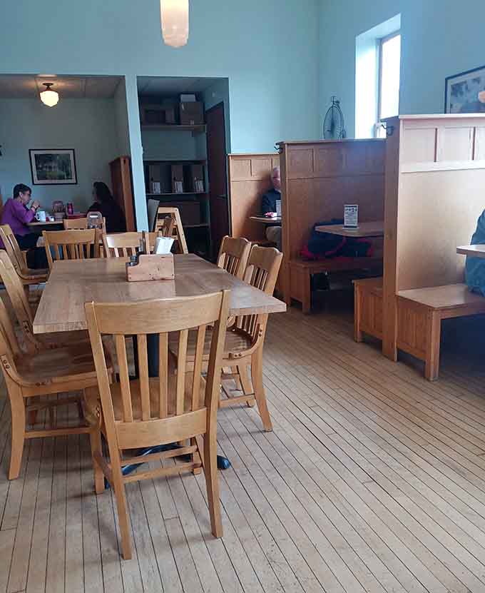 The spacious interior offers plenty of seating options, whether you prefer a booth for privacy or a table for people-watching.