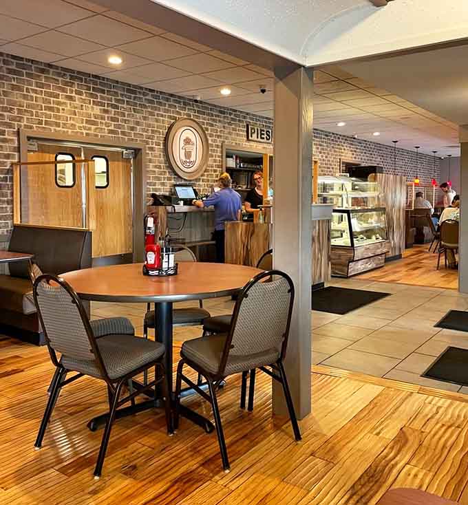 Historic photographs line the walls, offering glimpses into decades past while you enjoy timeless comfort food classics today.