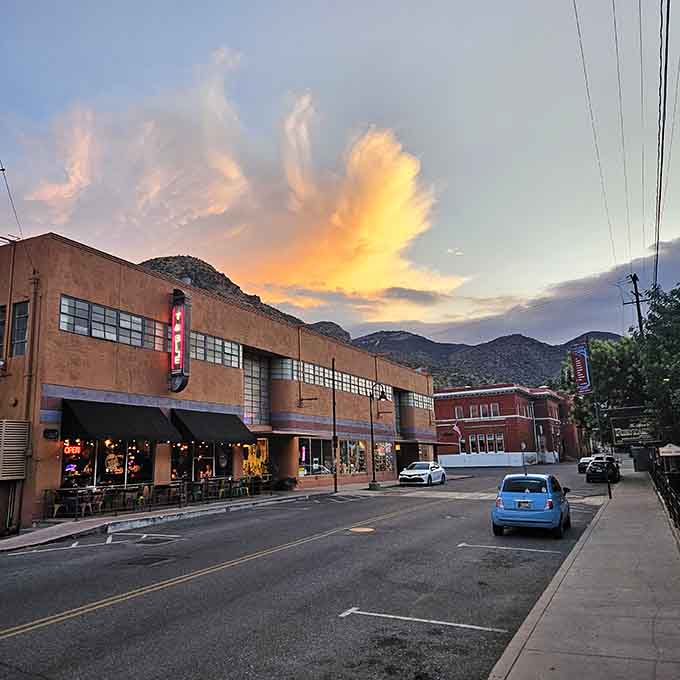Downtown Bisbee glows under a dramatic sunset that looks like nature decided to show off, painting the sky in colors that make even locals stop and stare.