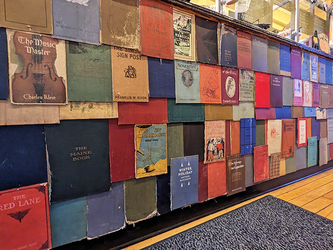 The colorful book wall serves as both decoration and inspiration &ndash; a patchwork quilt of stories waiting to be discovered.