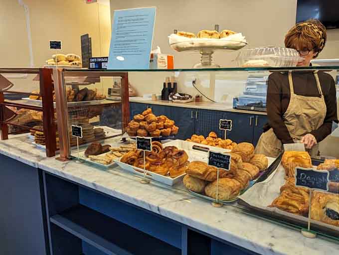 Scones and pastries arranged with the kind of care usually reserved for museum exhibits, except these you can eat.