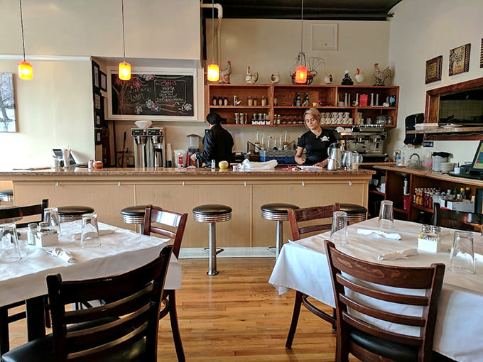 The counter seating offers front-row seats to breakfast magic, where you can watch culinary dreams come true.