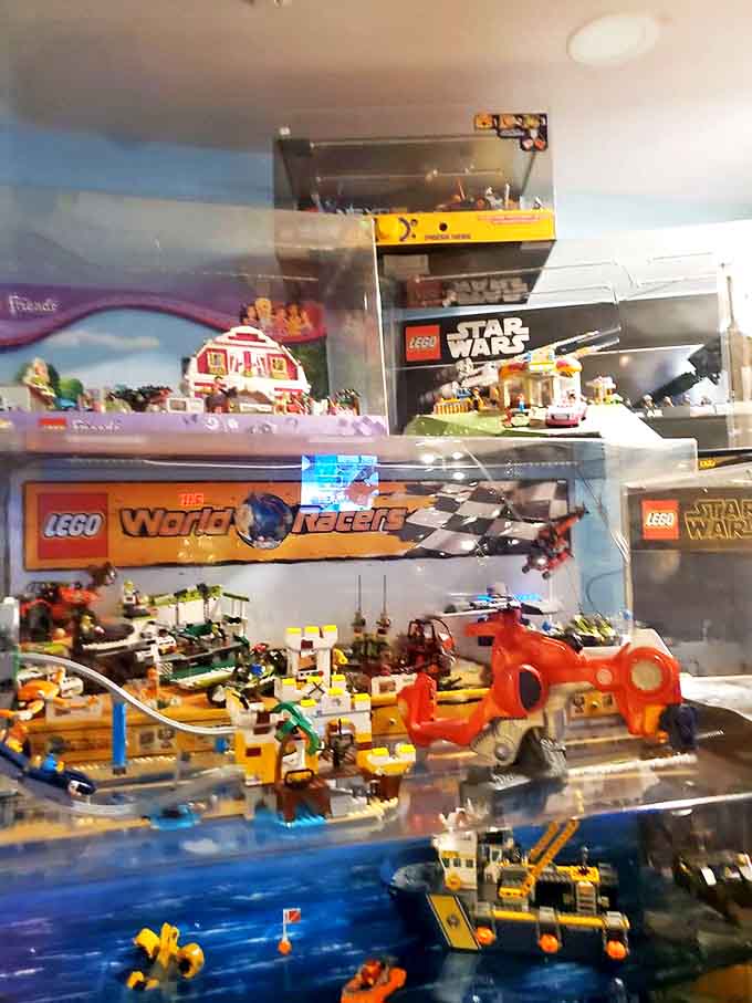 LEGO dreams come to life in this detailed display case, where plastic bricks transform into worlds of imagination that span from Star Wars to city streets.