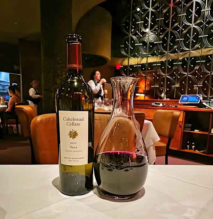 The wine collection stands like soldiers at attention, ready to be called into delicious service alongside your perfectly cooked steak.