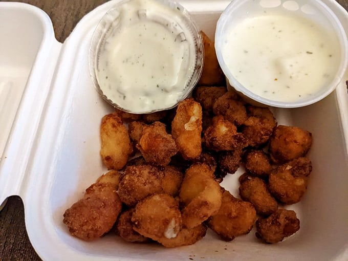 Wisconsin's favorite snack gets the royal treatment. These cheese curds are so fresh, they might just squeak "hello" when you bite into them.