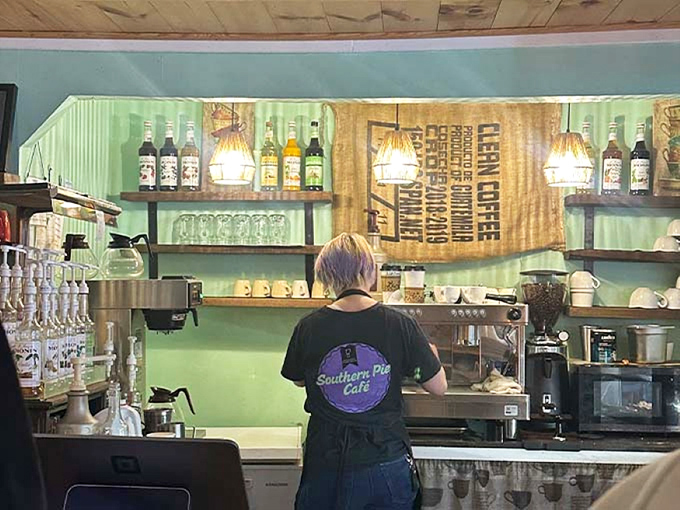 Behind the scenes magic: where coffee dreams come true against mint walls and burlap accents. Rustic charm at its finest.