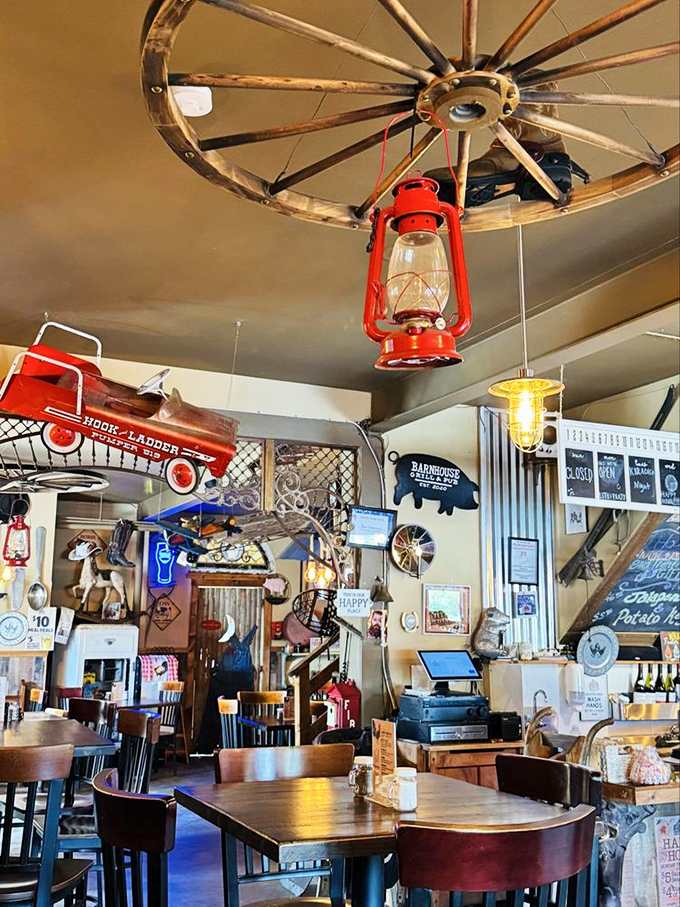 Vintage charm meets modern hospitality at the counter area, where red lanterns cast a warm glow over wood surfaces worn smooth by countless elbows.