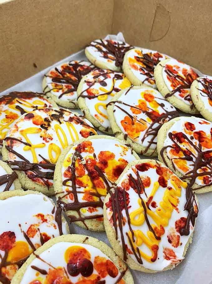 These sugar cookies aren't just desserts &ndash; they're edible art, splashed with colors and drizzles that make them almost too pretty to eat. Almost.