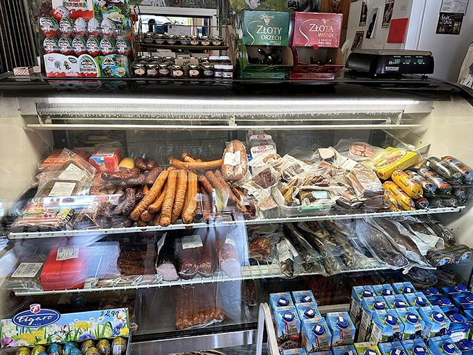 Sausage heaven behind glass &ndash; a carnivore's dream lineup of smoked, cured, and seasoned meats waiting to be taken home.