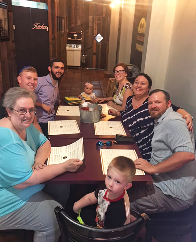 A gathering of happy faces around the table &ndash; proof that good food creates the kind of moments that bring people together across generations.