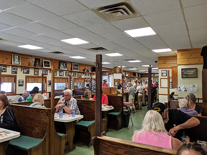 The diner's bustling interior, where efficiency meets hospitality and everyone leaves with a full stomach and smile.