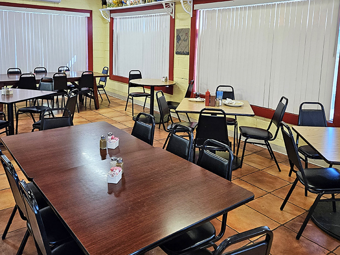 Dining Area: Simple tables and chairs bathed in natural light create an atmosphere where the food, not the decor, rightfully becomes the star.