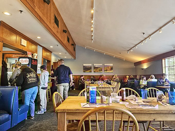 The dining area buzzes with conversation and the clinking of forks against plates, a symphony of satisfied customers enjoying their meals.