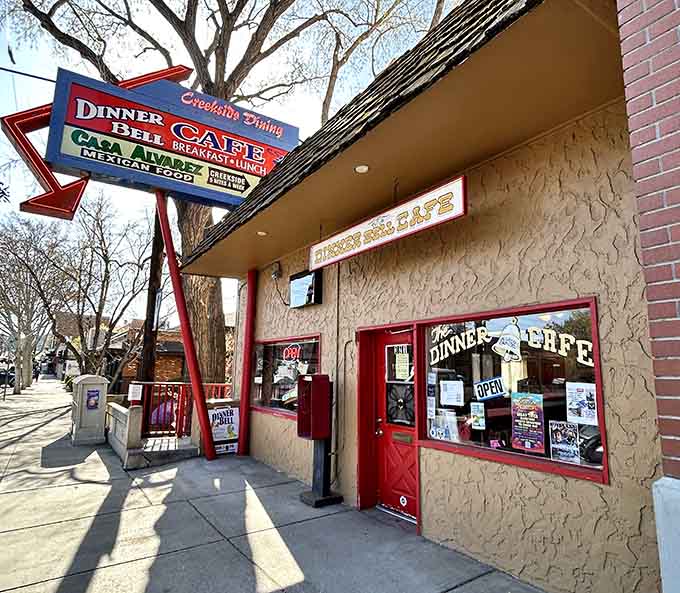 The vintage arrow sign points the way to some of the best Huevos Rancheros in Arizona.