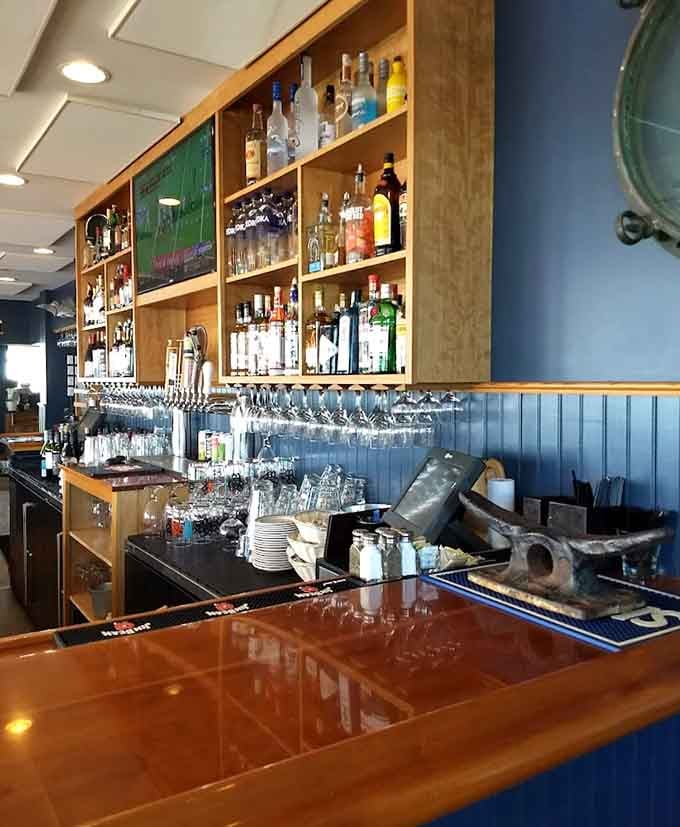 A well-stocked bar ready to pour whatever pairs best with your seafood feast and that million-dollar view.