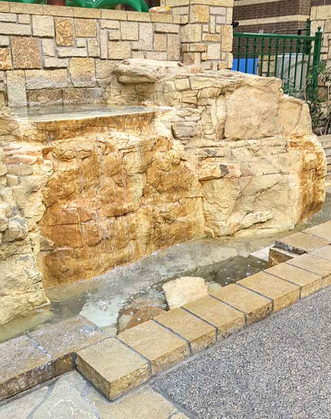 Water features trickle peacefully throughout the park, providing soothing sounds that almost drown out the joyful screaming of children.