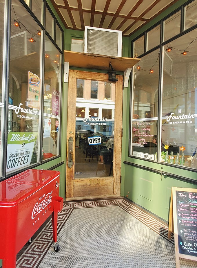 The entrance feels like a portal to simpler times &ndash; vintage Coca-Cola cooler and hand-painted signage signal you've found somewhere special.