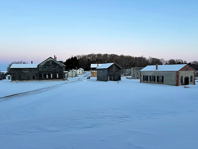 Winter transforms Fayette into a snow-covered wonderland, the white blanket softening industrial edges into something almost ethereal.