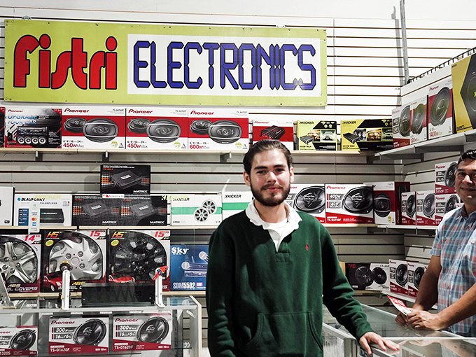 A cheerful pause at Fistri Electronics, where everyday tech and human connection meet.