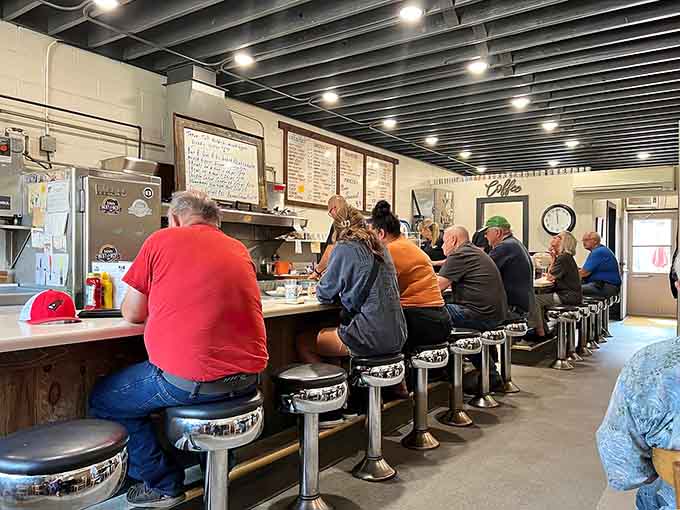That classic diner counter setup with swivel stools is an American institution, and Frieda's keeps the tradition alive one breakfast at a time.