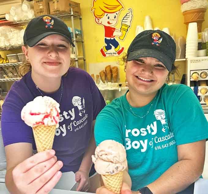Scoop specialists at work: The friendly faces behind the counter, creating frozen happiness one cone at a time.
