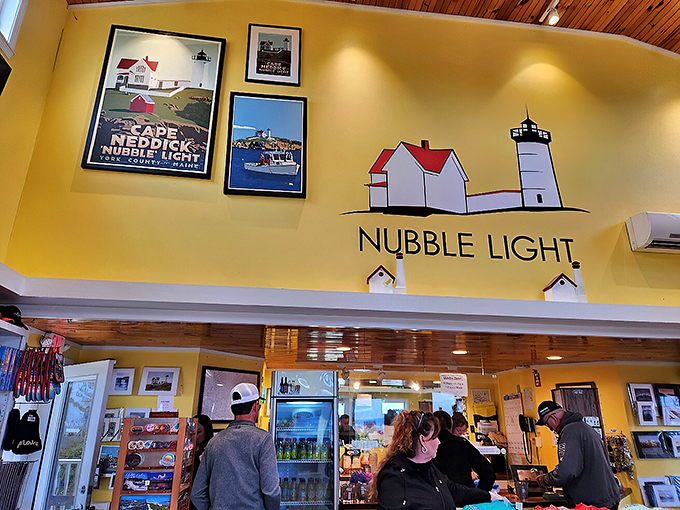 Inside the visitor center, lighthouse memorabilia and local treasures await, while yellow walls radiate coastal cheer.