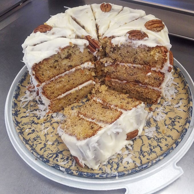 Layer upon layer of sweet temptation! This towering cake is so good, it should come with a happiness warning.