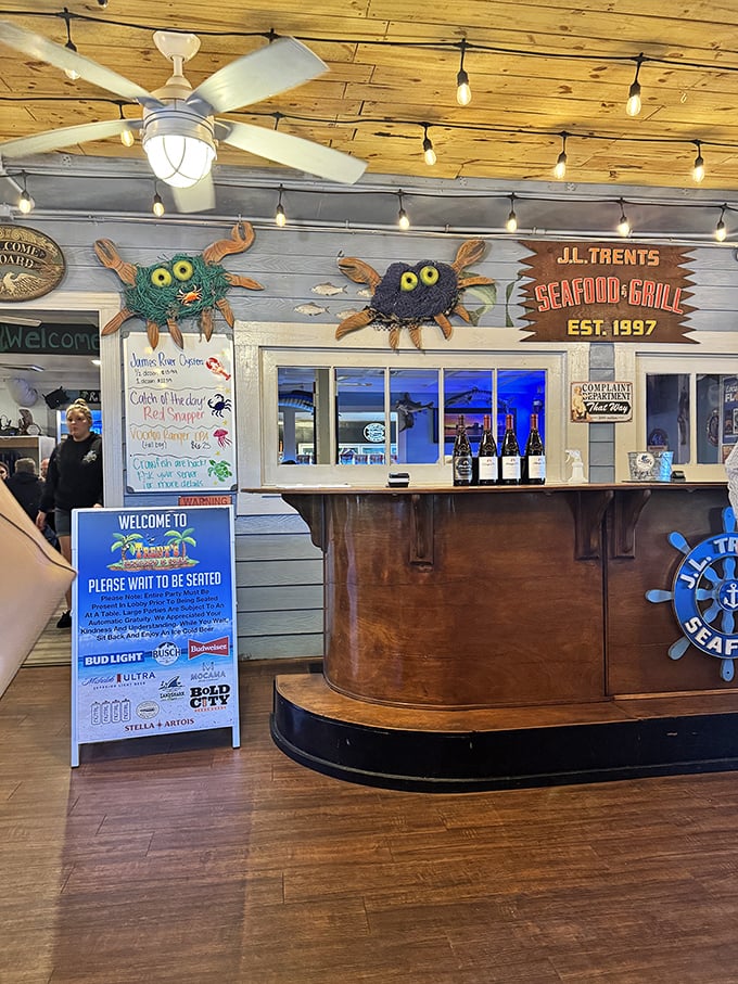 Whimsical crab decorations welcome you to seafood paradise &ndash; they're practically waving "come on in" with their claws.