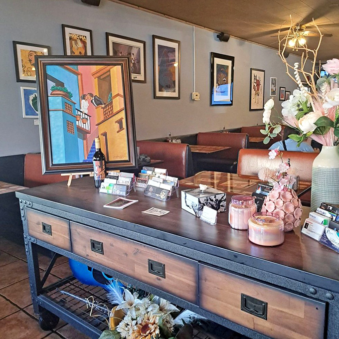 Interior Display: Art and memorabilia create a visual playlist across the walls, while fresh flowers add notes of color to the caf&eacute;'s composition.