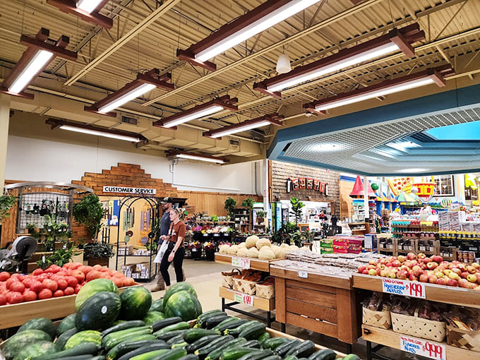 Fresh produce fills the section with colorful abundance, proving this place does normal grocery things exceptionally well.