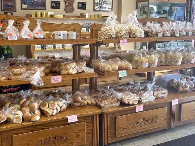 Wooden shelves lined with bagged treats create a warm, welcoming atmosphere that makes you want to buy extras for later, or for friends, or just because.