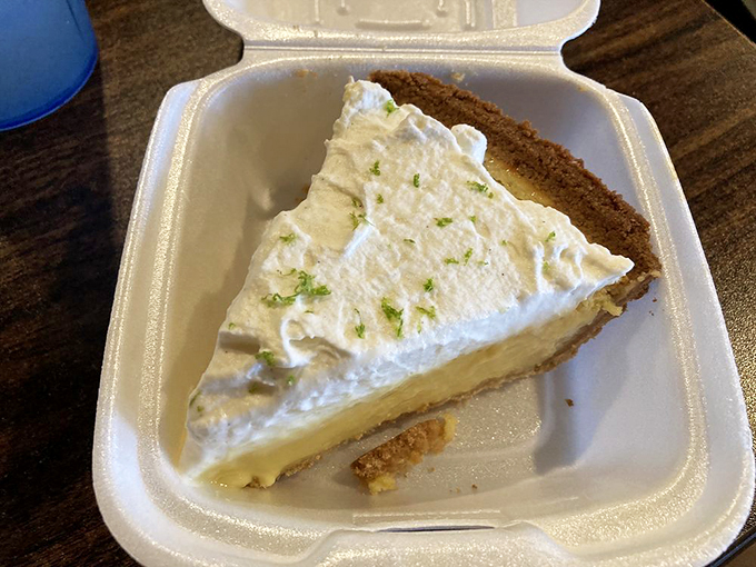 A slice of sunshine! This key lime pie is the perfect zesty finale to your BBQ feast, transporting you to a Florida beach.