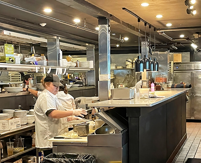 Culinary choreography in action &ndash; where fresh ingredients transform into memorable meals under skilled hands.