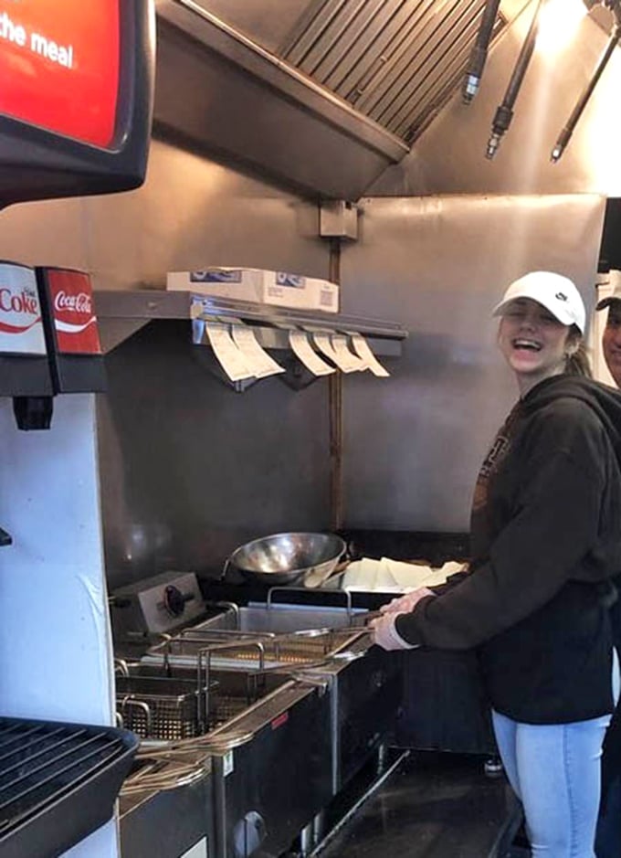 Behind the scenes magic where ordinary potatoes become extraordinary fries, a glimpse into the kitchen that's been satisfying hungry travelers for decades.
