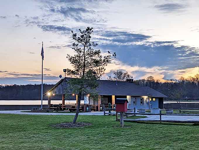 Evening settles over the lakeside pavilion, where the day's final light transforms ordinary architecture into something magical.