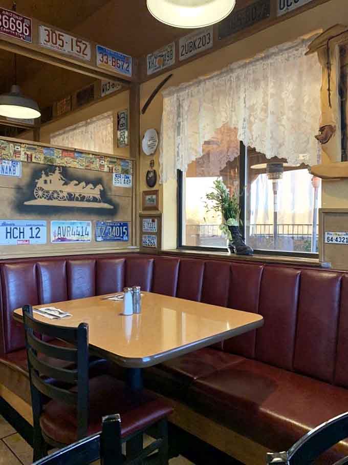 Cozy booth seating with a view of the Arizona landscape beyond, making every meal feel like a mini-vacation from everyday life.