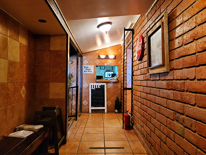 The entryway &ndash; humble and unassuming, like the culinary treasures that await beyond these terracotta walls.