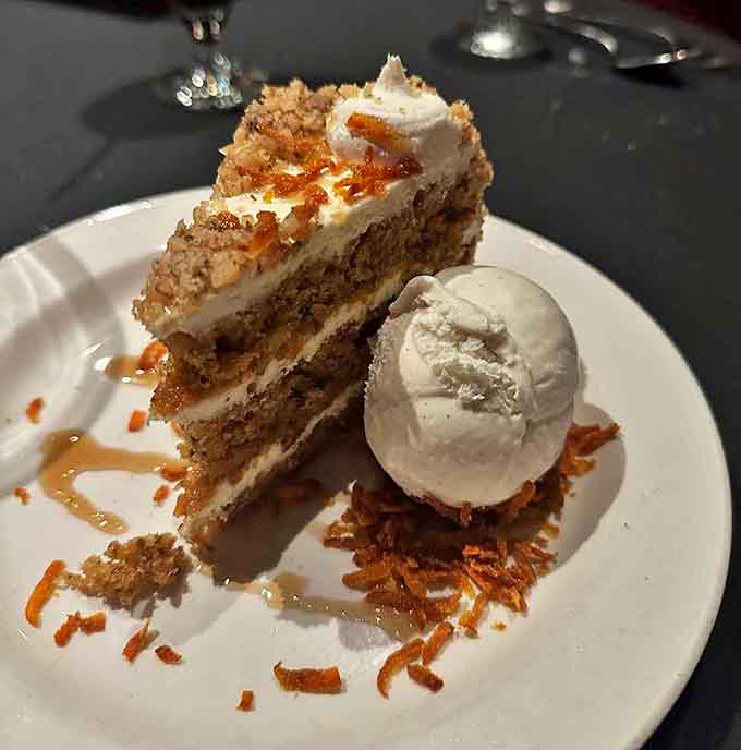 Is that a smile in your carrot cake? Even dessert seems happy to be here in this temple of culinary excellence.