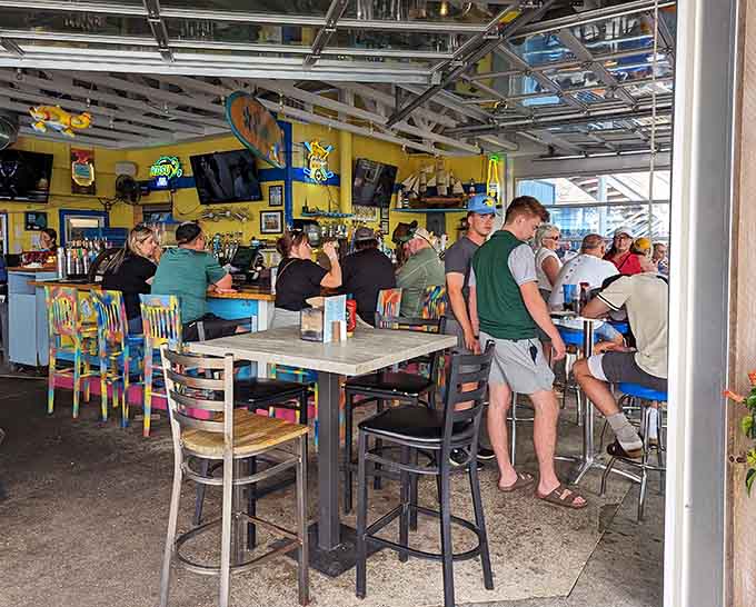 Happy diners gather around communal tables, proving that great food brings people together every single time.