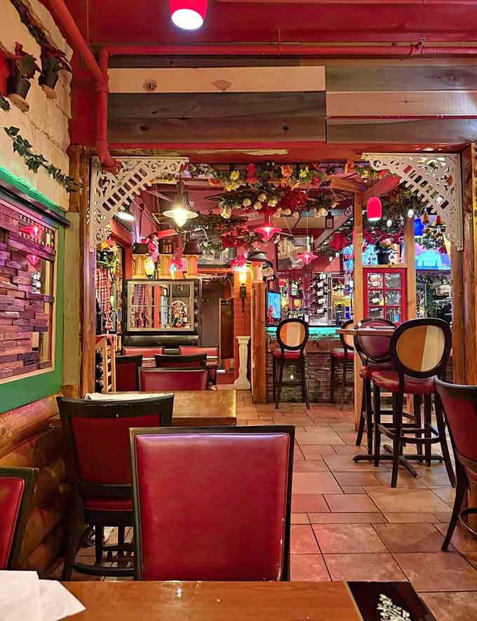 Cozy seating areas with burgundy leather chairs have absorbed more garlic aromas than most people consume in a lifetime, creating an authentically Italian atmosphere.