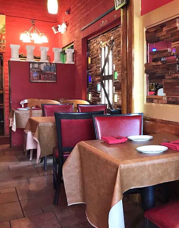 Cozy booths and warm lighting create the perfect atmosphere for lingering over wine and pretending you have room for dessert.