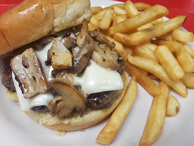 The Mushroom Swiss Burger: where earthy meets gooey. It's a fungi-tastic flavor explosion that'll have you saying "Oh my, Swiss!"