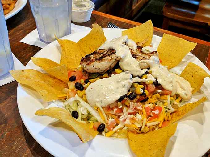 Nachos that require a strategy: Do you tackle the cheese-laden center first, or work your way in from the perfectly garnished edges?