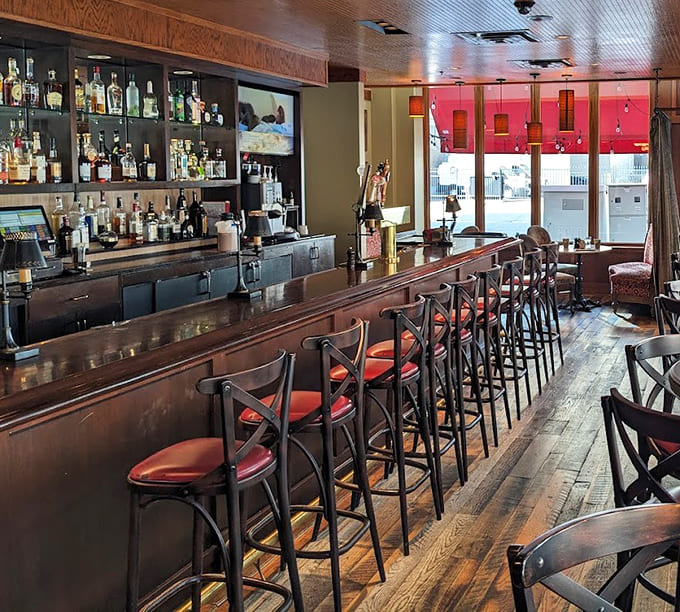 A classic bar setup where the bartender actually knows how to make a proper Old Fashioned without consulting their phone first.