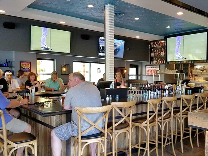 The bar area where craft beers and cocktails wait to complement your smoky, savory meal perfectly.