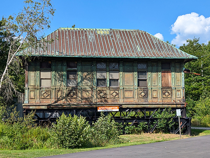 Skilled craftspeople work diligently in the restoration barn, using traditional techniques to bring deteriorated trolleys back to their former glory.