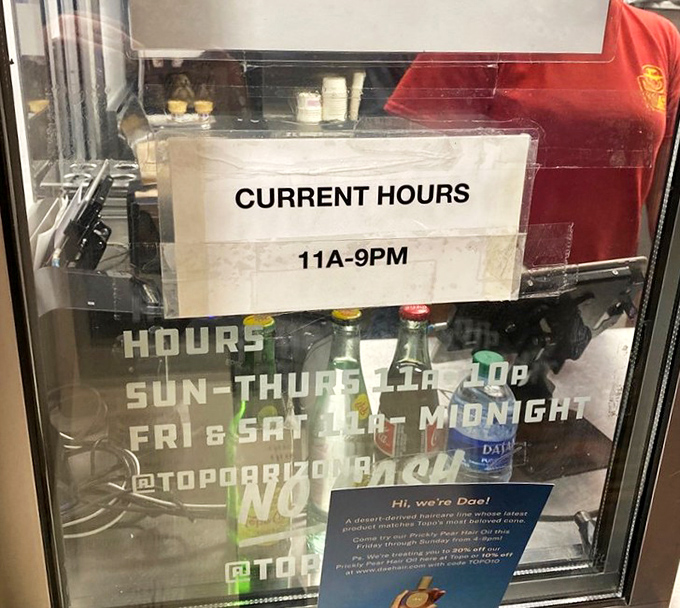 Hours posted clearly - because knowing when you can get your next brisket burrito fix is essential information.