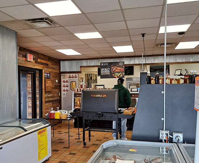 Where the magic happens and orders are placed, featuring more smoked meat options than you can shake a rib at.