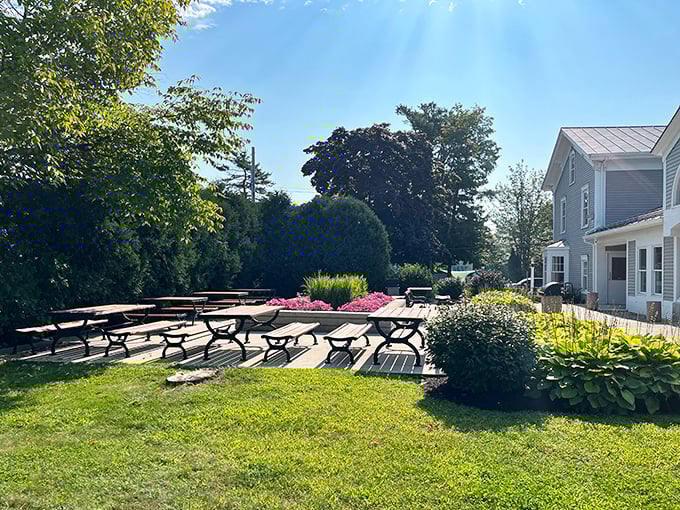 Outdoor seating arranged on a patio that could easily host a colonial-era garden party instead of Big Mac enthusiasts.
