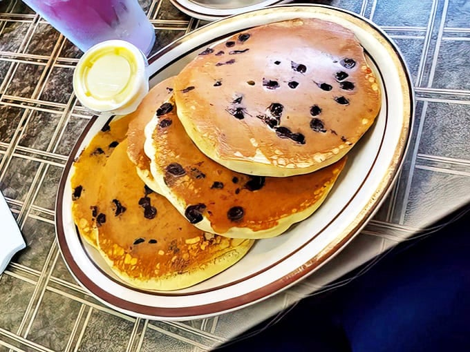 Blueberry pancakes that could make a grown adult weep with joy &ndash; fluffy, golden, and studded with bursts of fruit in every bite.